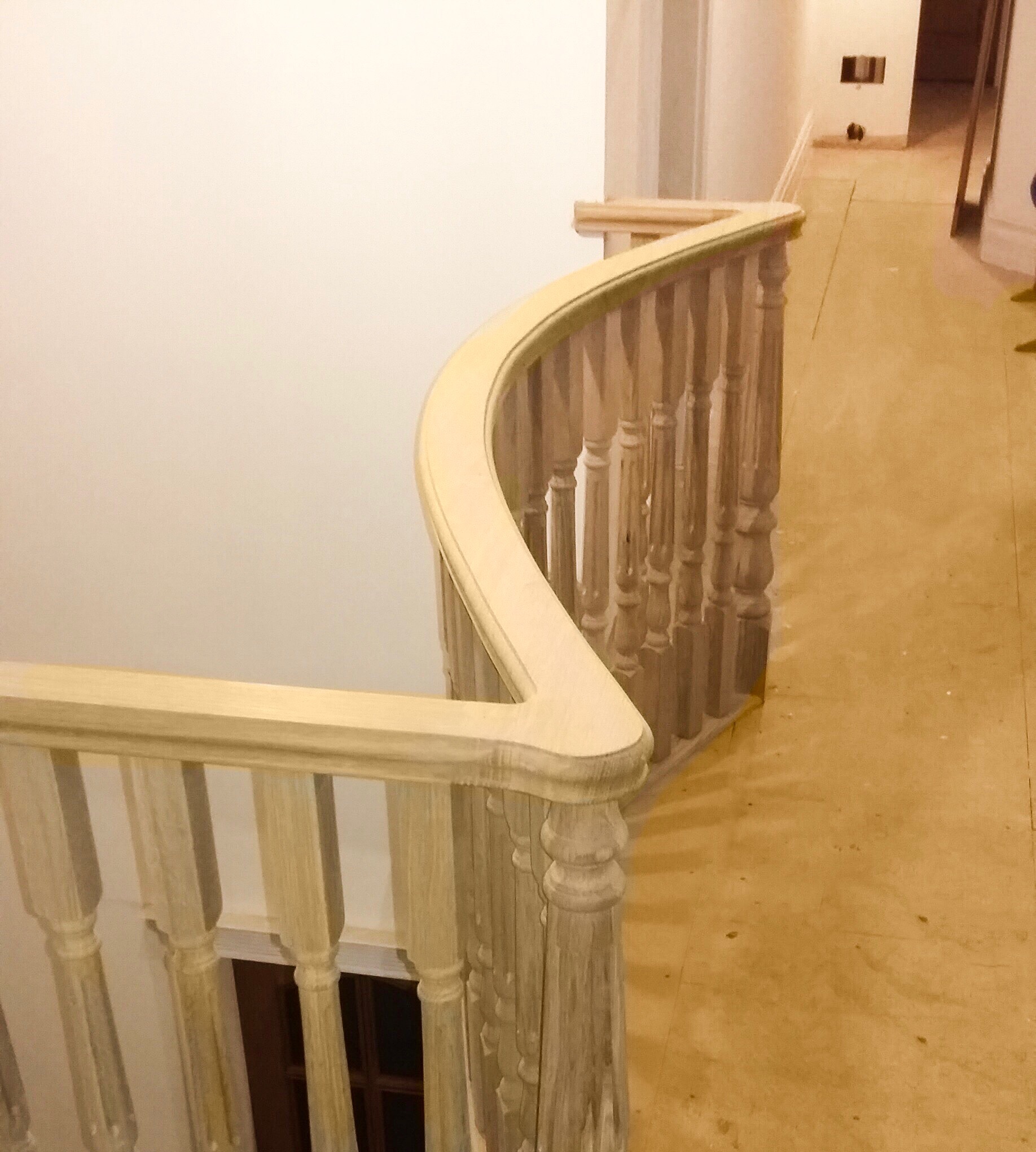 gallery featuring stairs and spindles